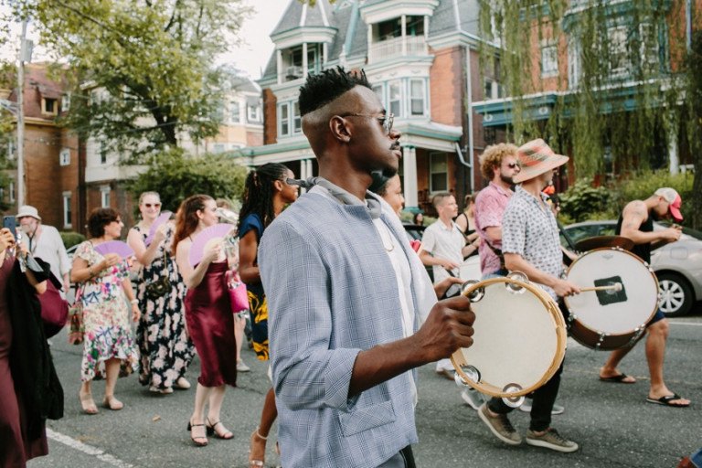 This Fun Philly Block Party Wedding Began with a Carnival-Style Parade