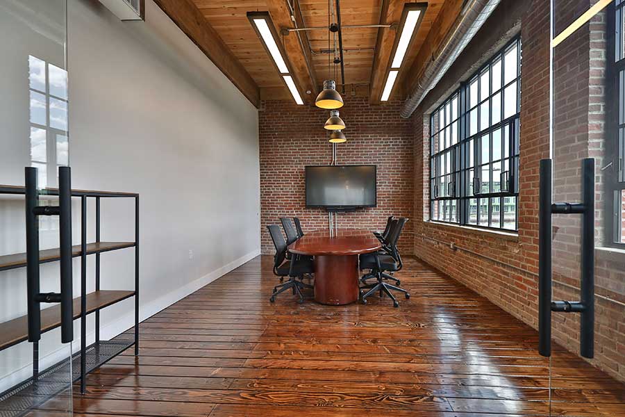This Real Estate Company Renovated a Historic Building for Its New Office